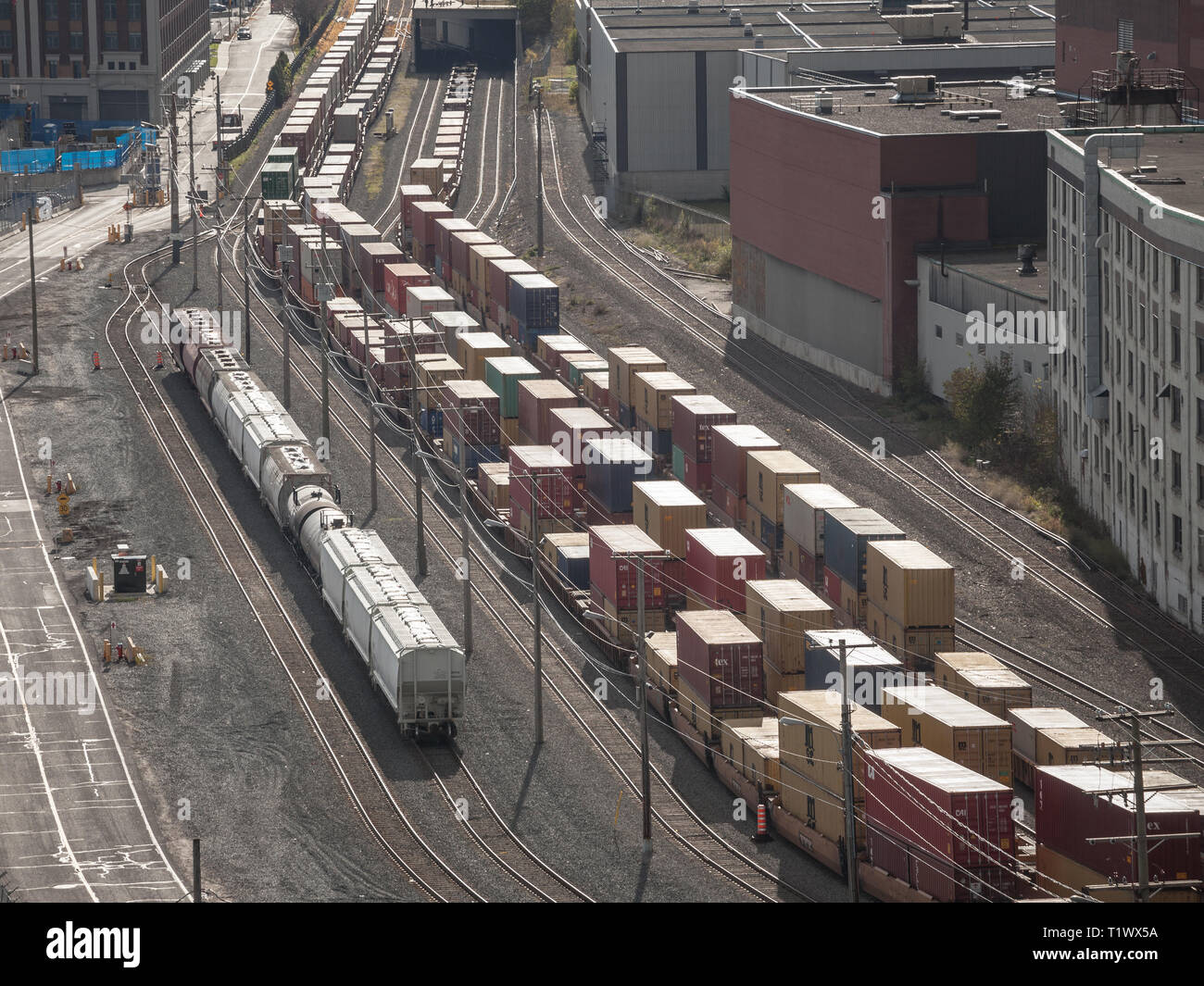 MONTREAL, CANADA - NOVEMBER 8, 2018: Railyard with container trains and ...