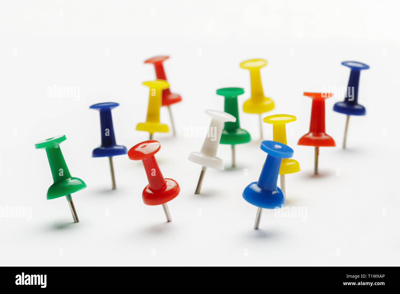 Push pins isolated on white background Stock Photo - Alamy