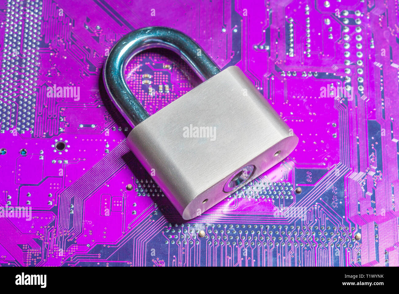 padlock on a computer circuit board Stock Photo - Alamy