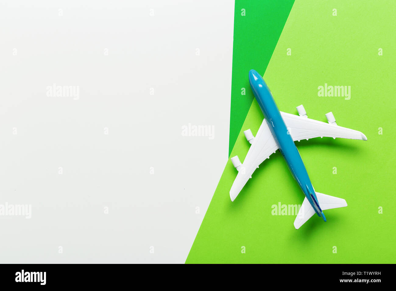 Miniature airplane travel theme Stock Photo - Alamy