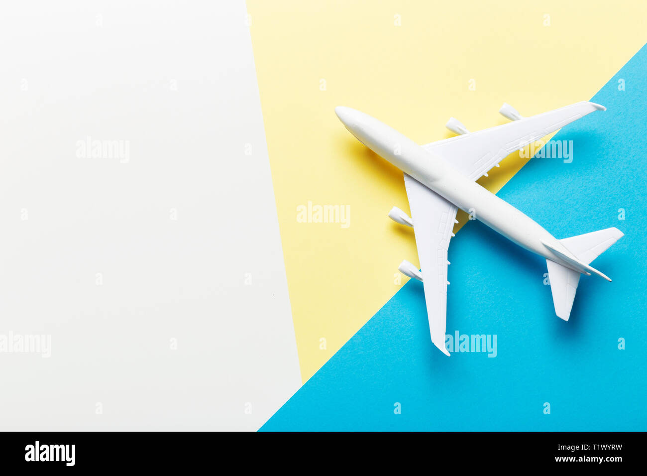 Miniature airplane travel theme Stock Photo - Alamy