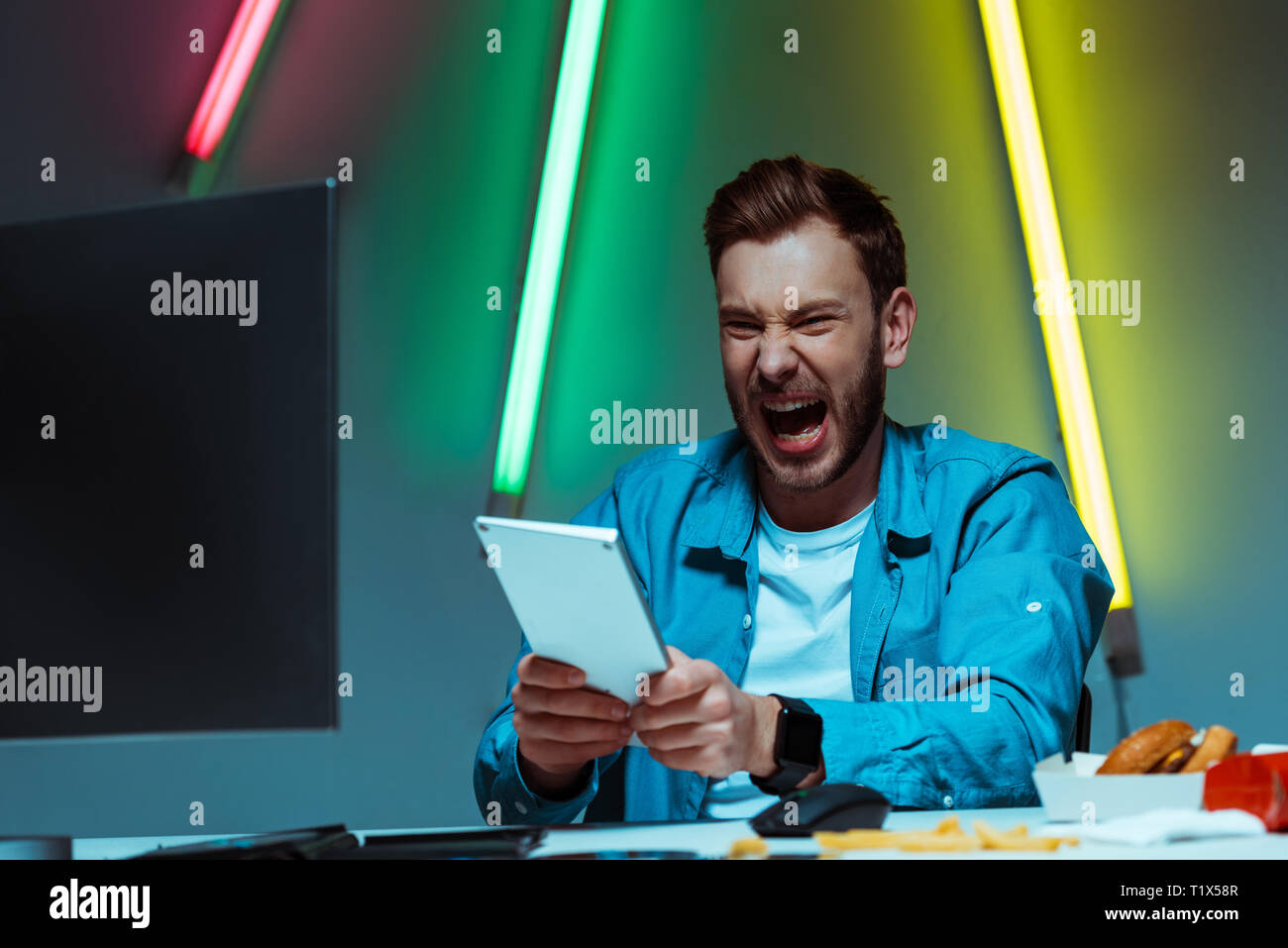 Angry man at computer hi-res stock photography and images - Alamy