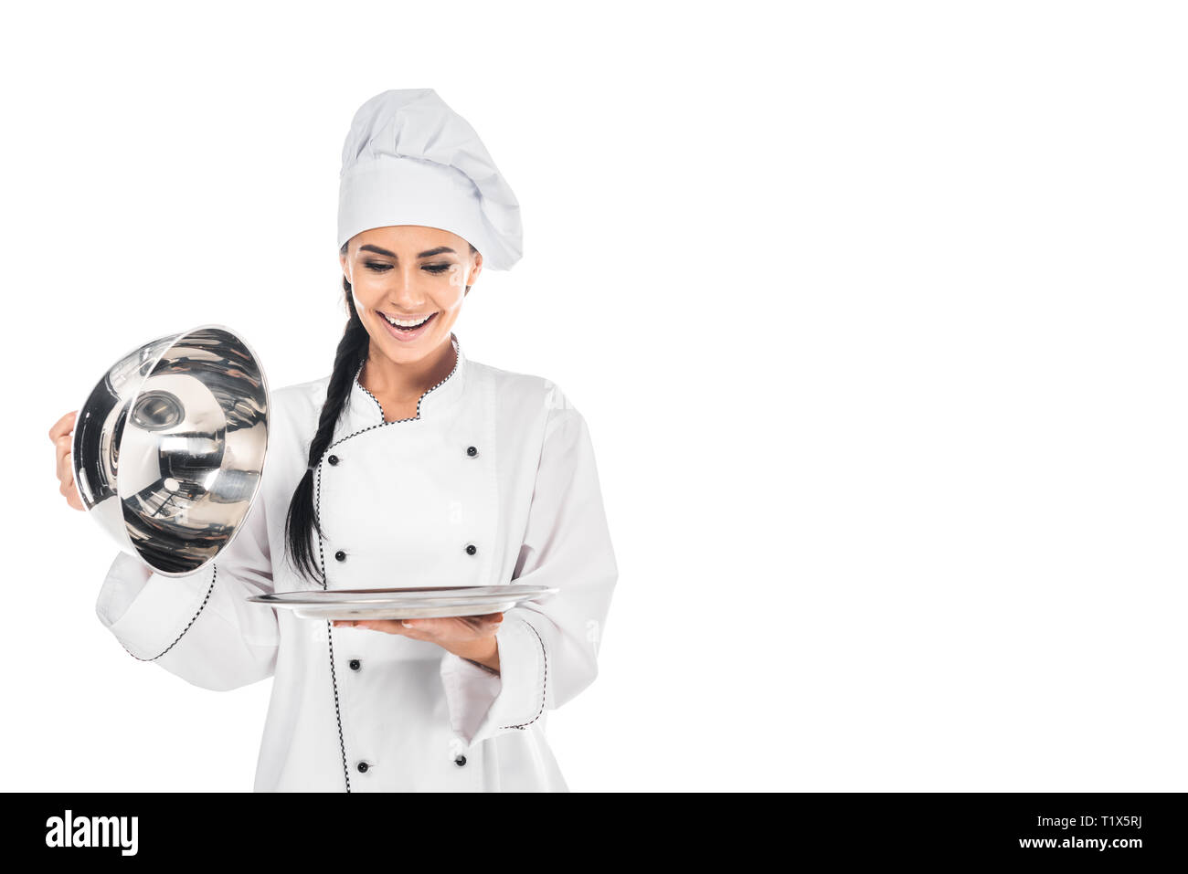 Chef in hat holding tray with cloche isolated on white Stock Photo - Alamy