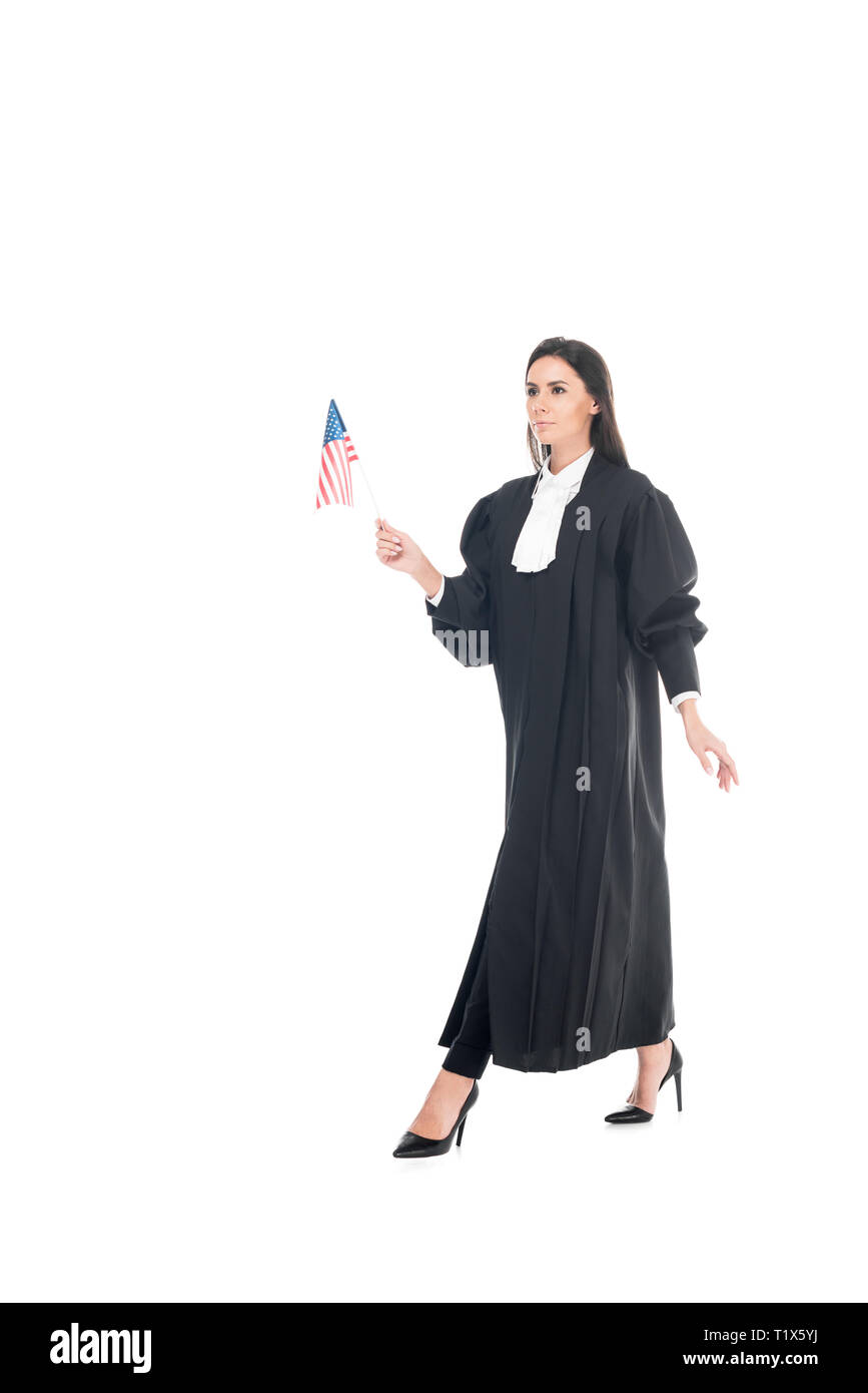 Judge in judicial robe holding american flag and walking isolated on ...