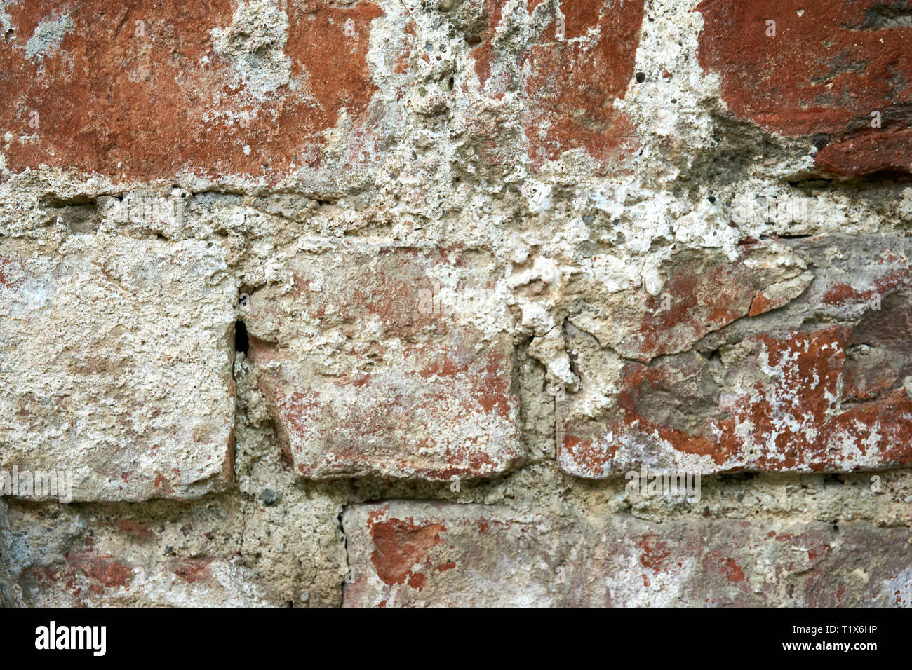 cracked color on a wall outside Stock Photo - Alamy