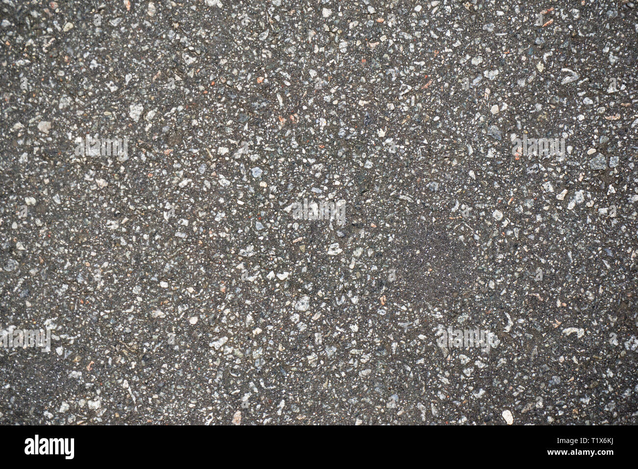 destructed tar road in a town Stock Photo - Alamy
