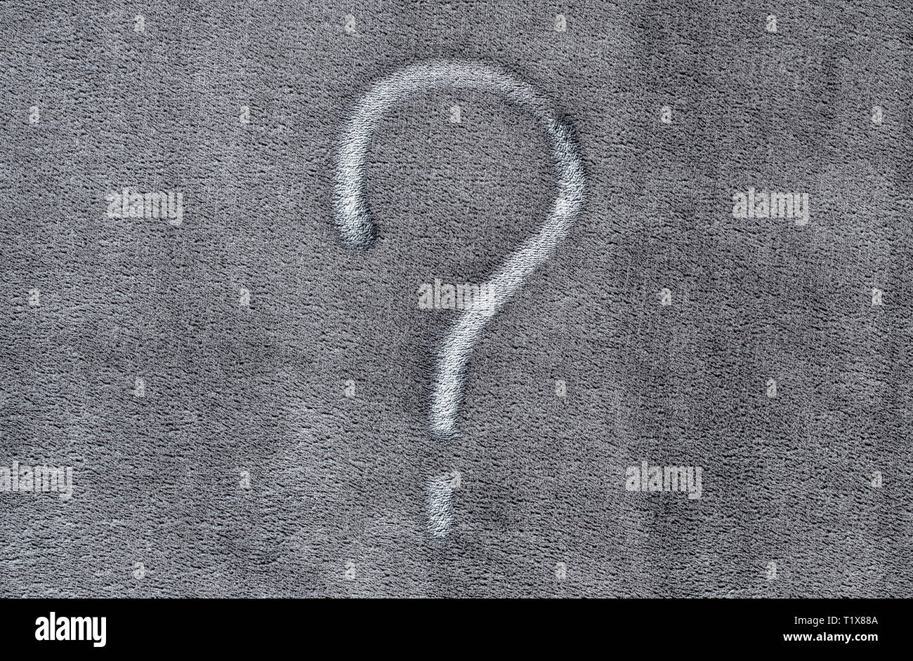 Question mark on gray fabric texture background Stock Photo - Alamy