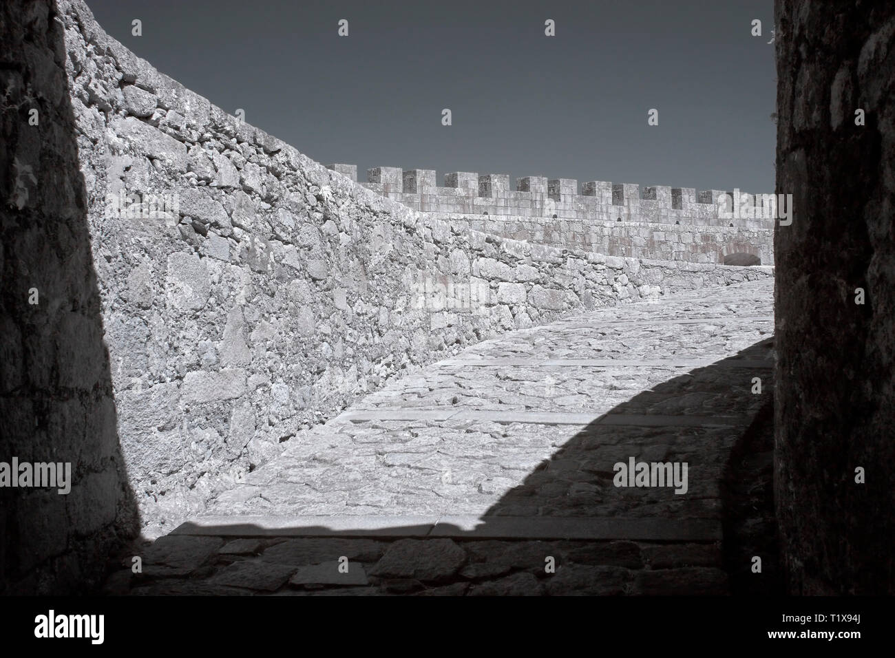 Interior access to the battlements of an old medieval european granite ...