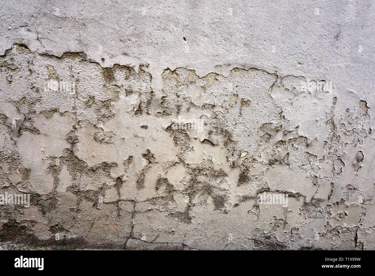 cracked color on a wall outside Stock Photo - Alamy