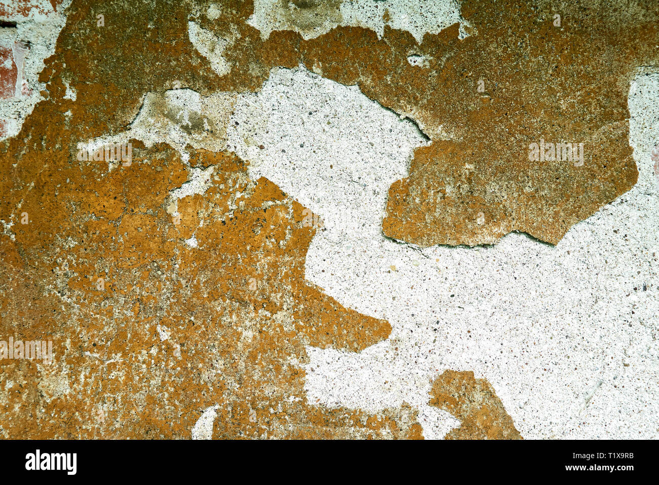 cracked color on a wall outside Stock Photo - Alamy