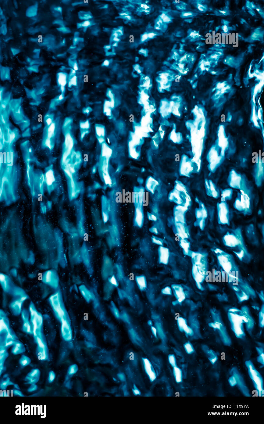 Abstract blue liquid surface as background - futuristic design and ...