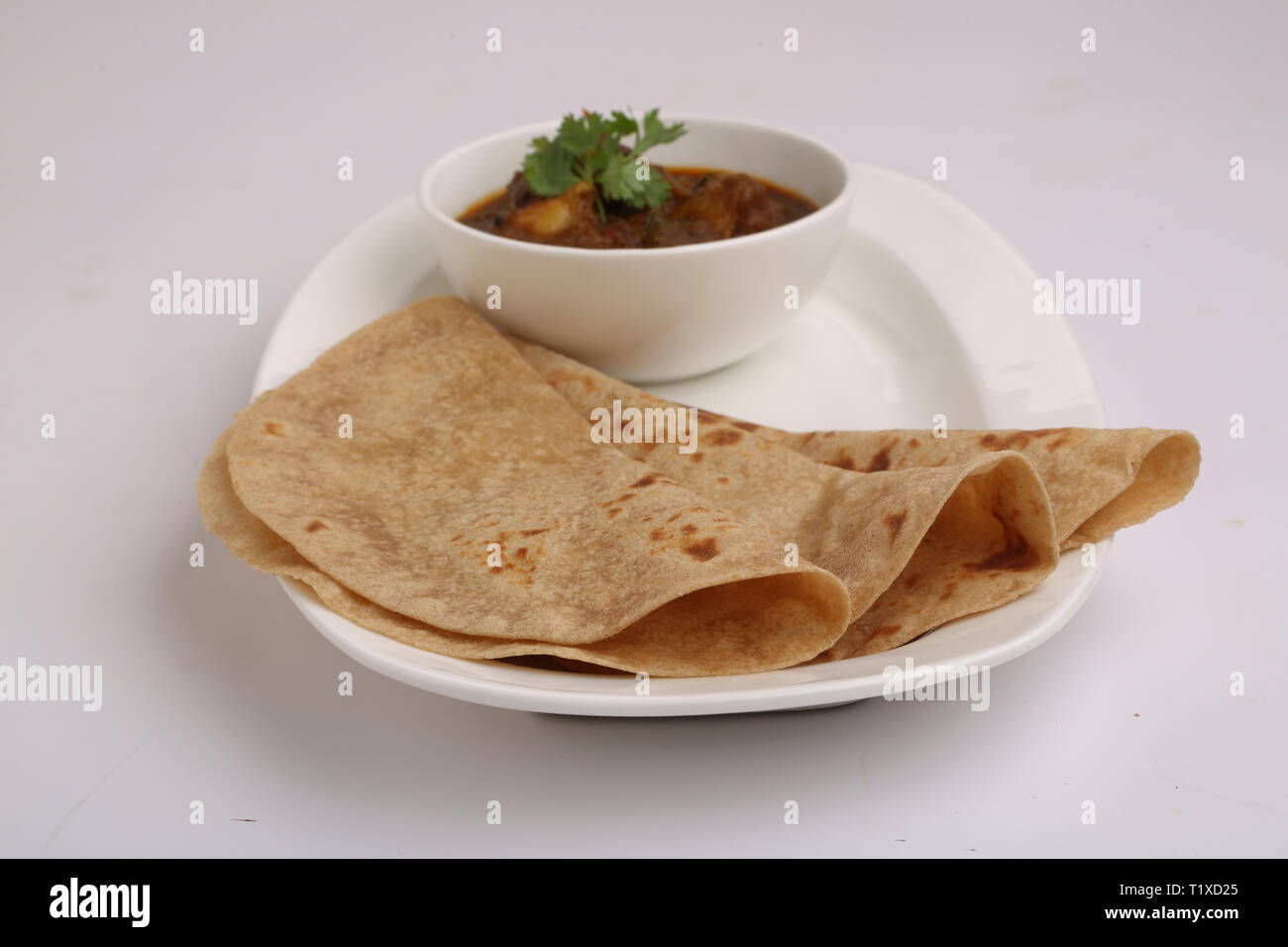 chappati with chicken curry Stock Photo - Alamy