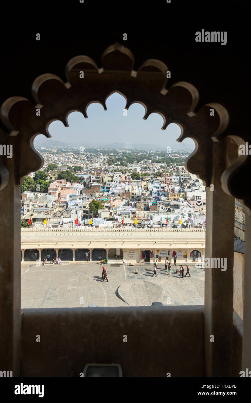 City view through window pan at City Palace,Udaipur,Rajasthan,India ...