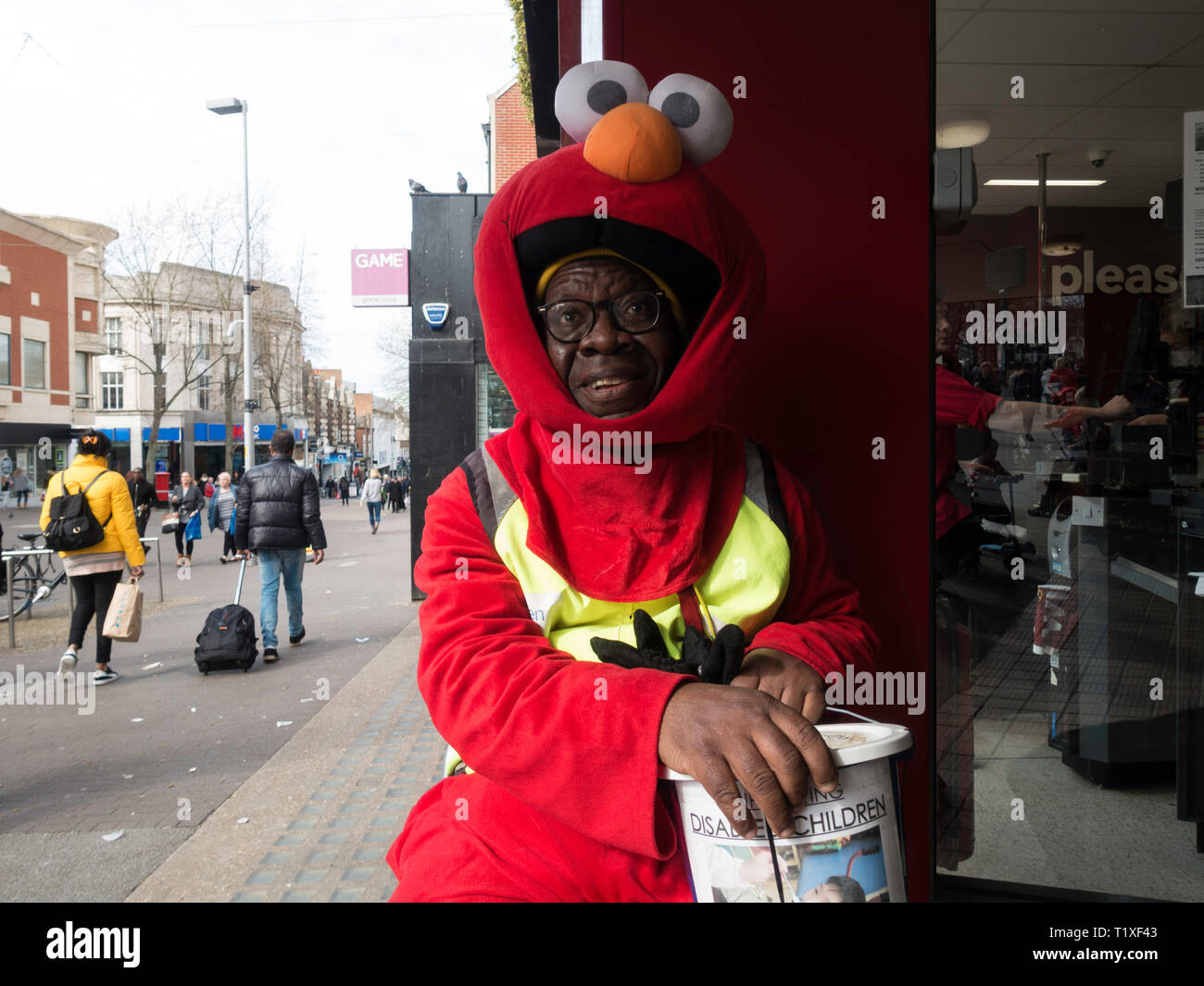 A charity worker dressed as elmo hi-res stock photography and images ...