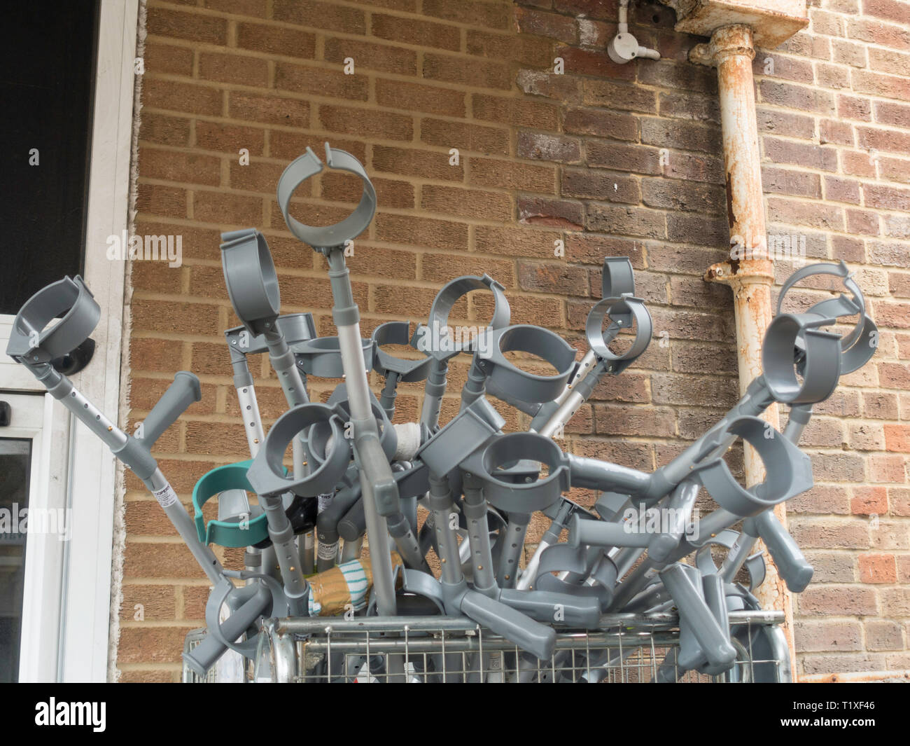 Crutches in a bin Stock Photo - Alamy