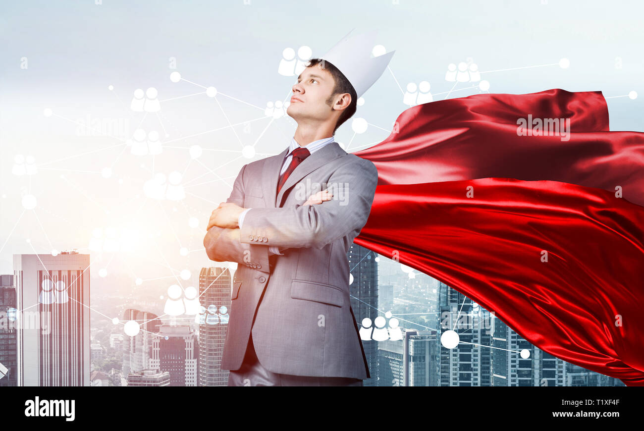 Concept of power and sucess with businessman superhero in big city ...