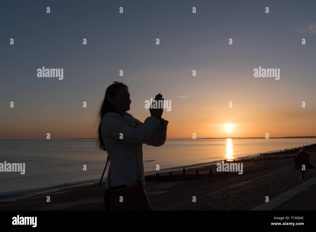 Sunset praying hi-res stock photography and images - Alamy