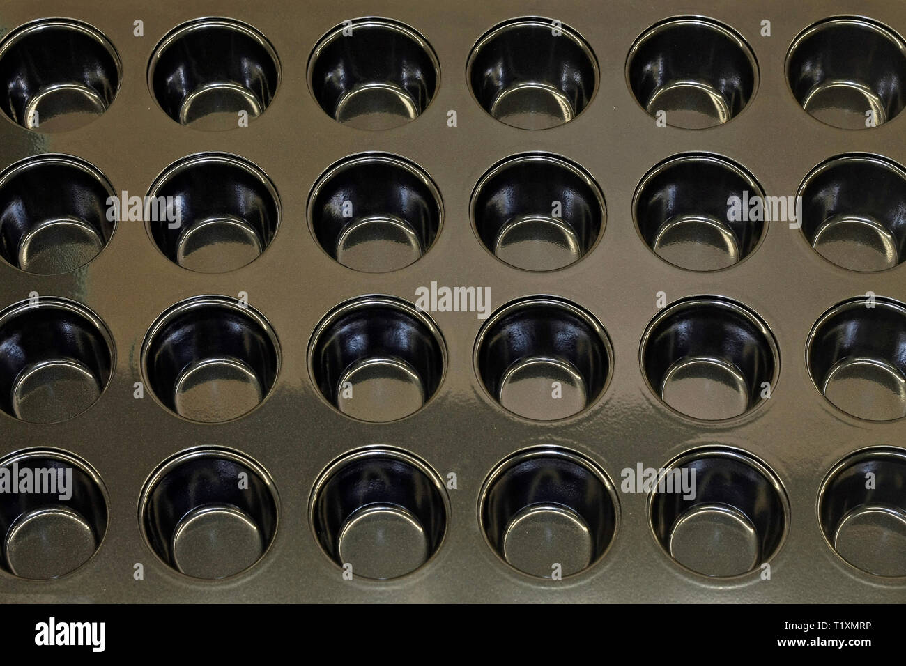 Background made from metal cookie tray holes Stock Photo - Alamy