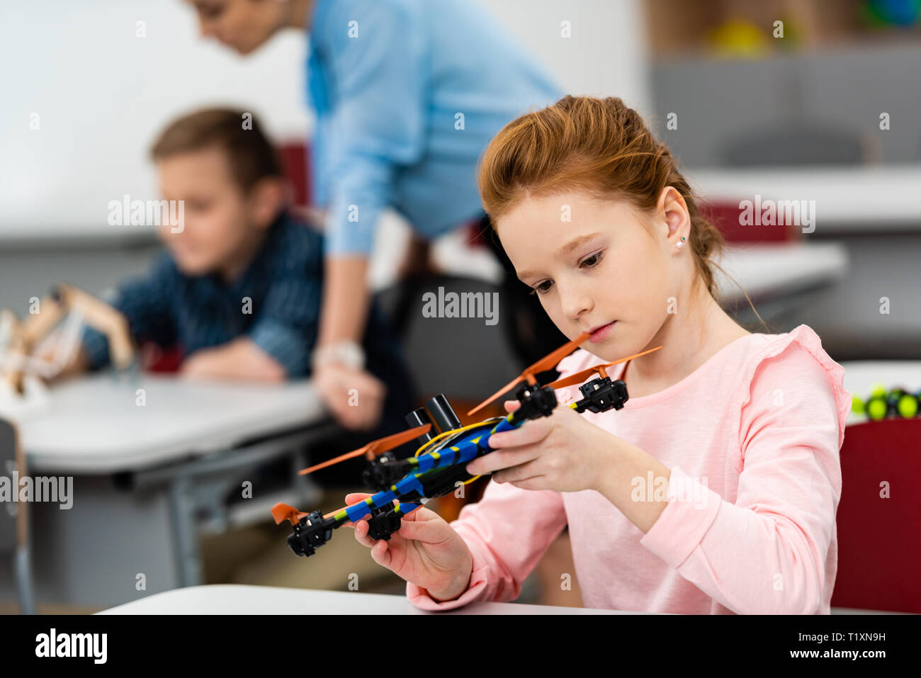Kids playing toys classroom hi-res stock photography and images - Alamy
