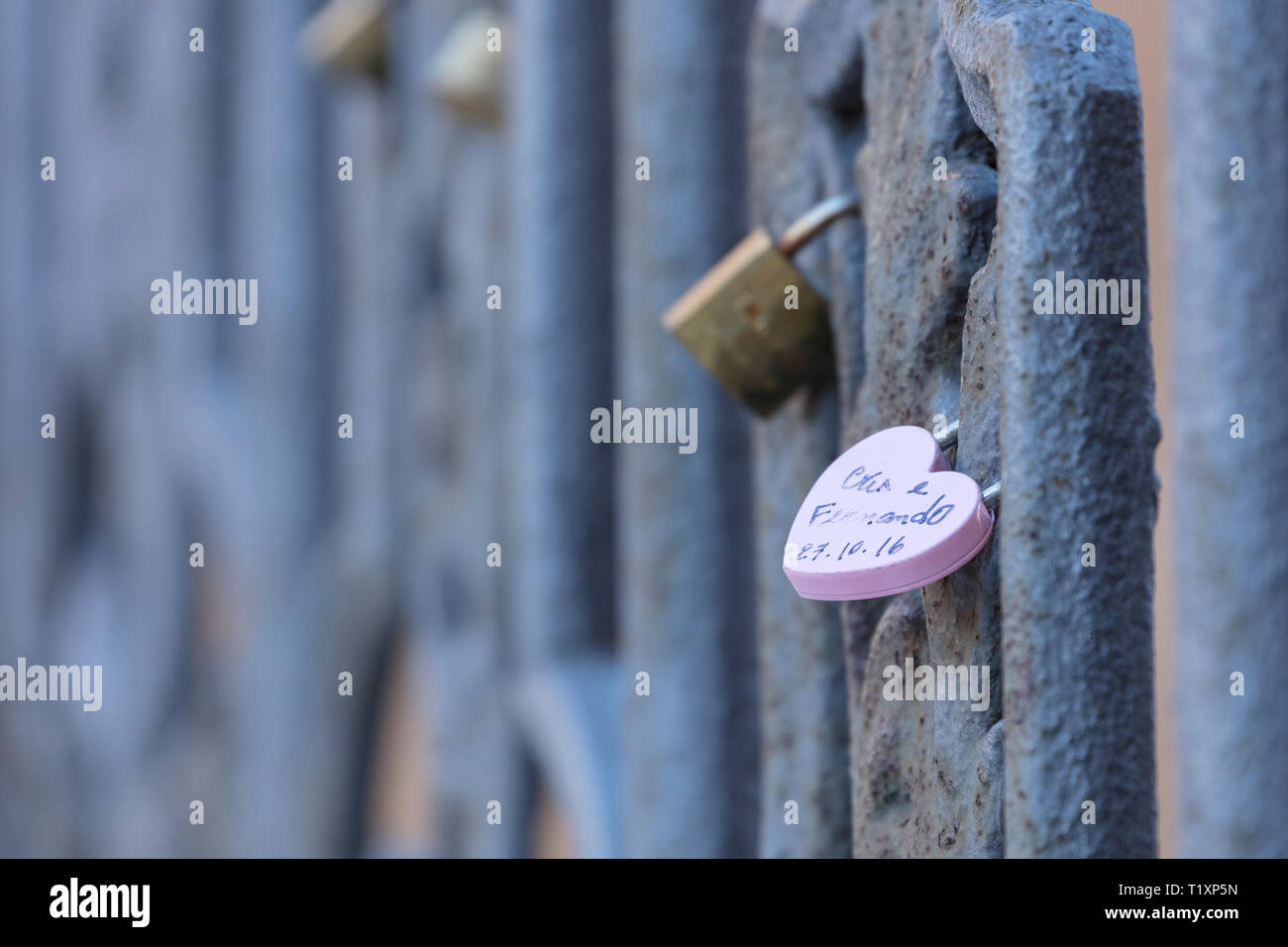 Venice heart shaped padlock attached to railings Stock Photo - Alamy