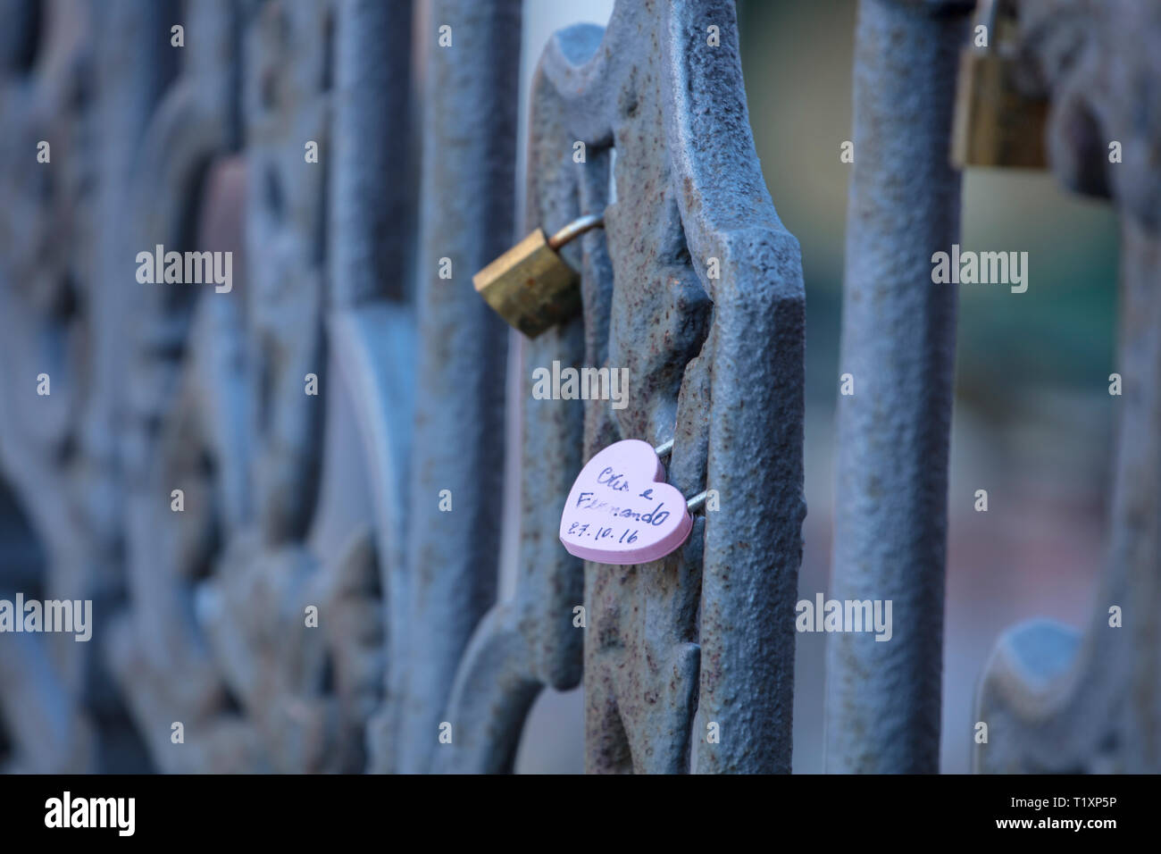 Venice heart shaped padlock attached to railings Stock Photo - Alamy