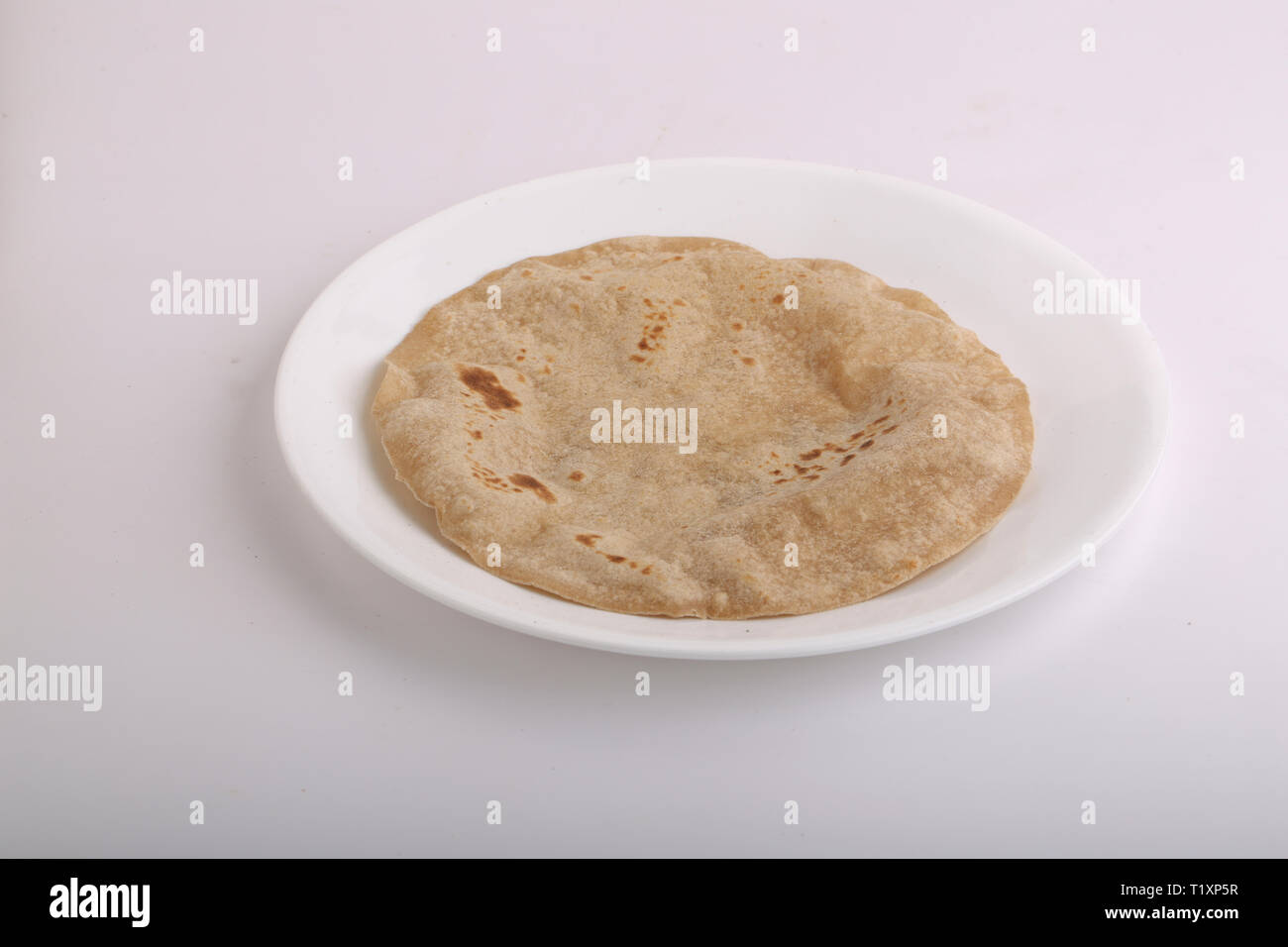 Chapati single hi-res stock photography and images - Alamy