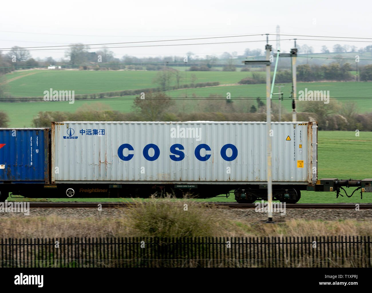 Cosco shipping container on a freightliner train, West Coast Main Line ...