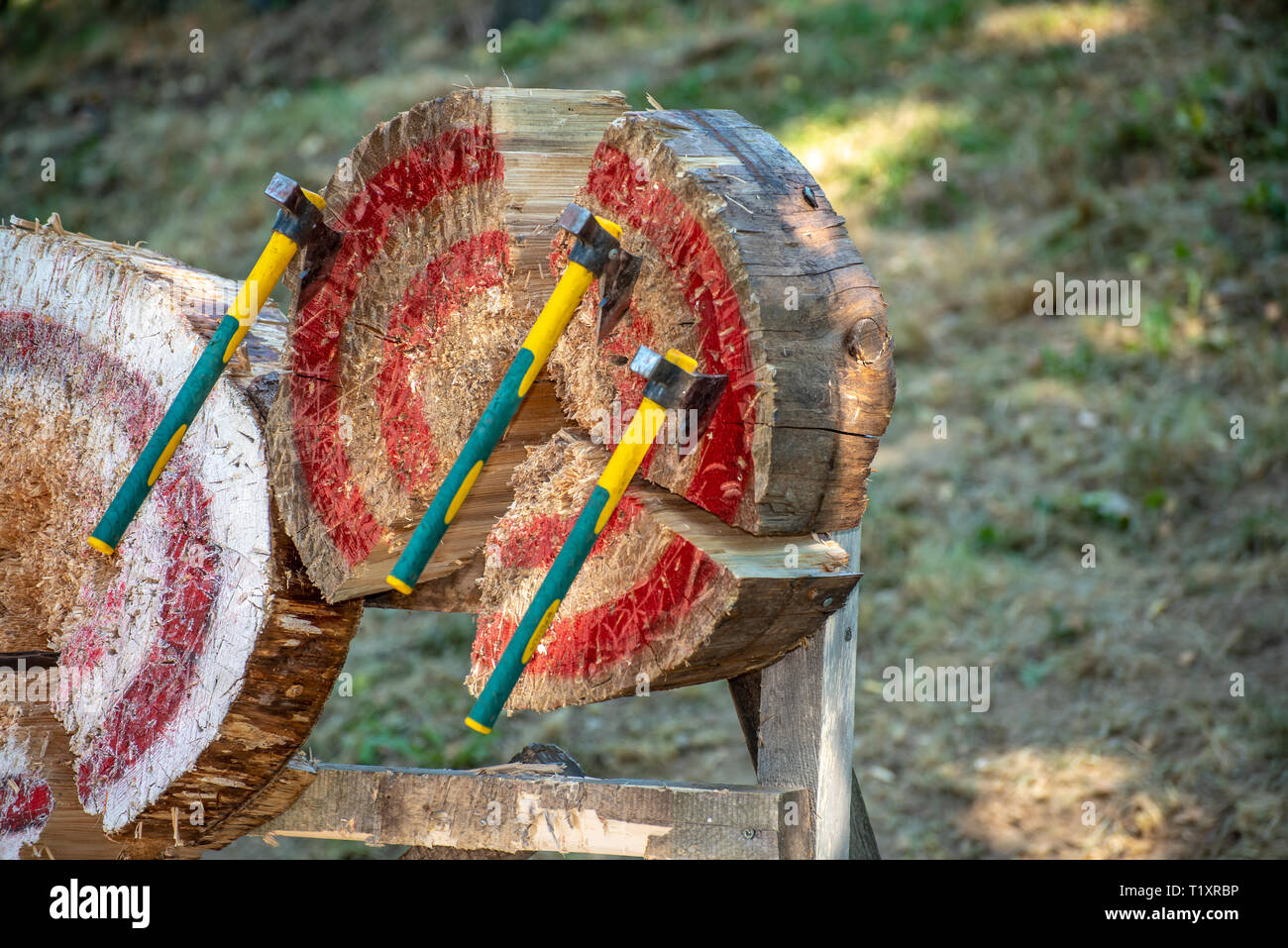 Axe flying to target center Stock Photo - Alamy