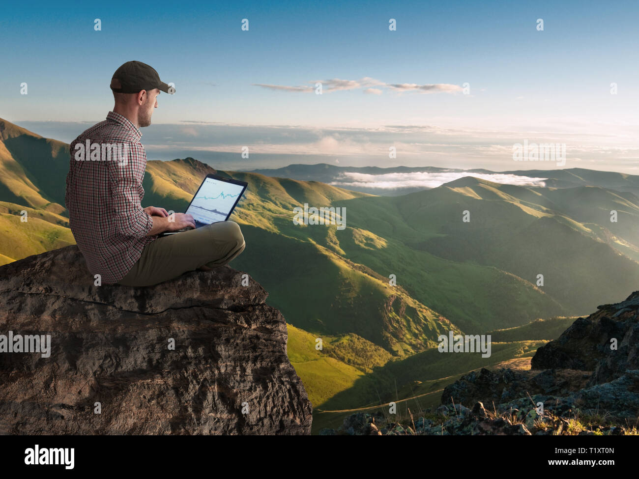 Working at computer outdoors hi-res stock photography and images - Alamy