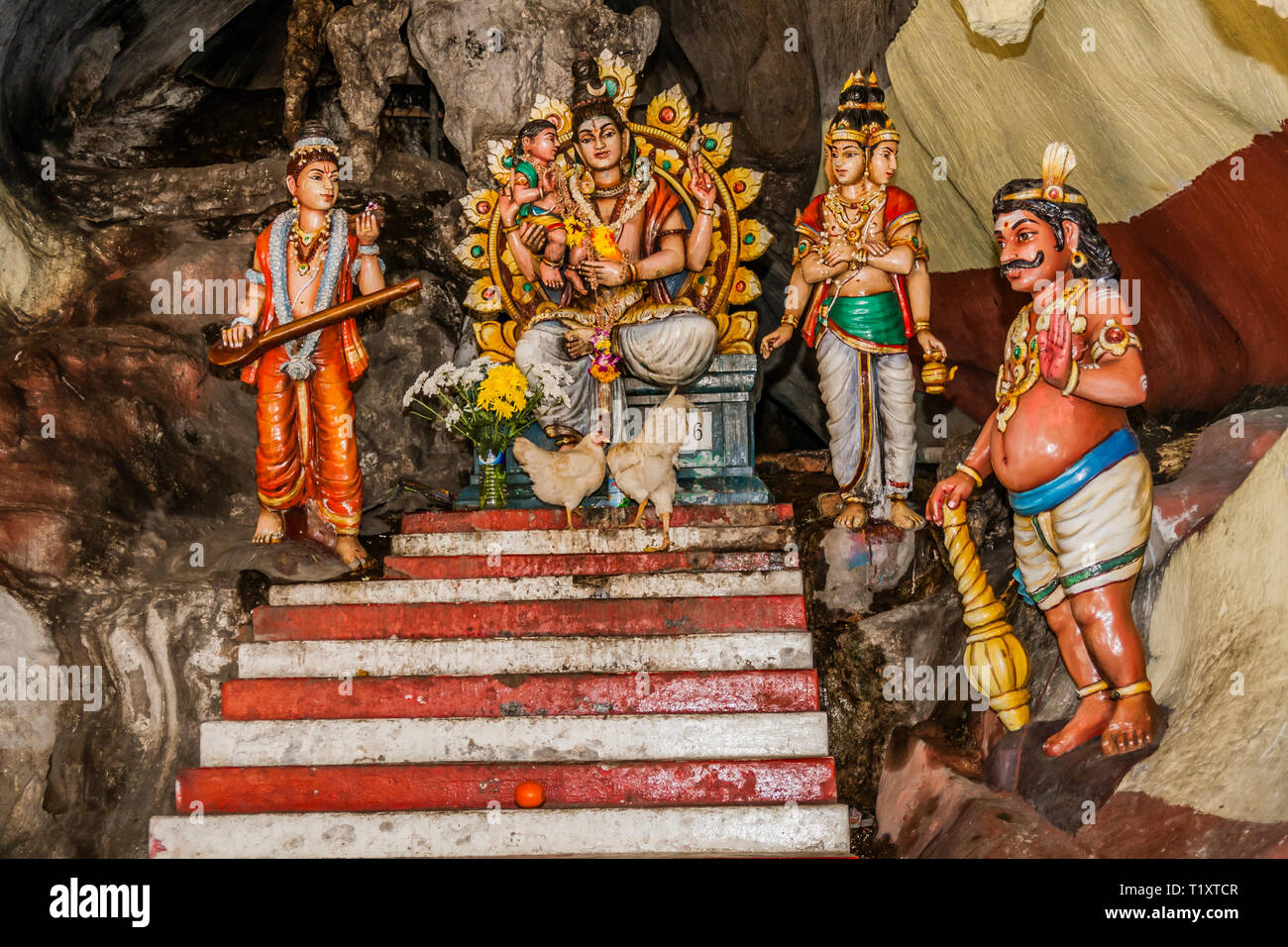 One of the altars with alive hens inside of the Batu Caves, Kuala ...