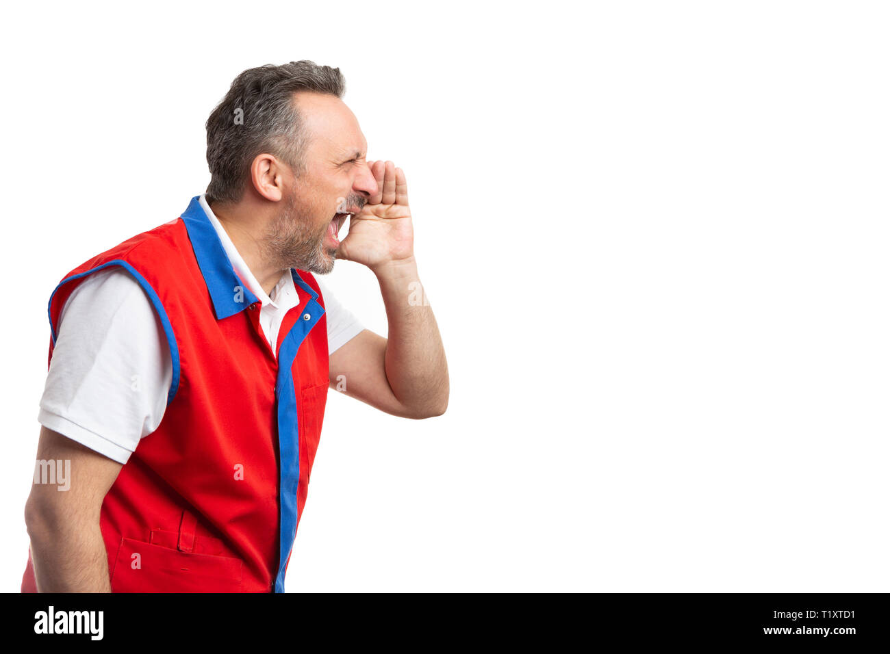 Hypermarket or supermarket male employee making shouting gesture with ...