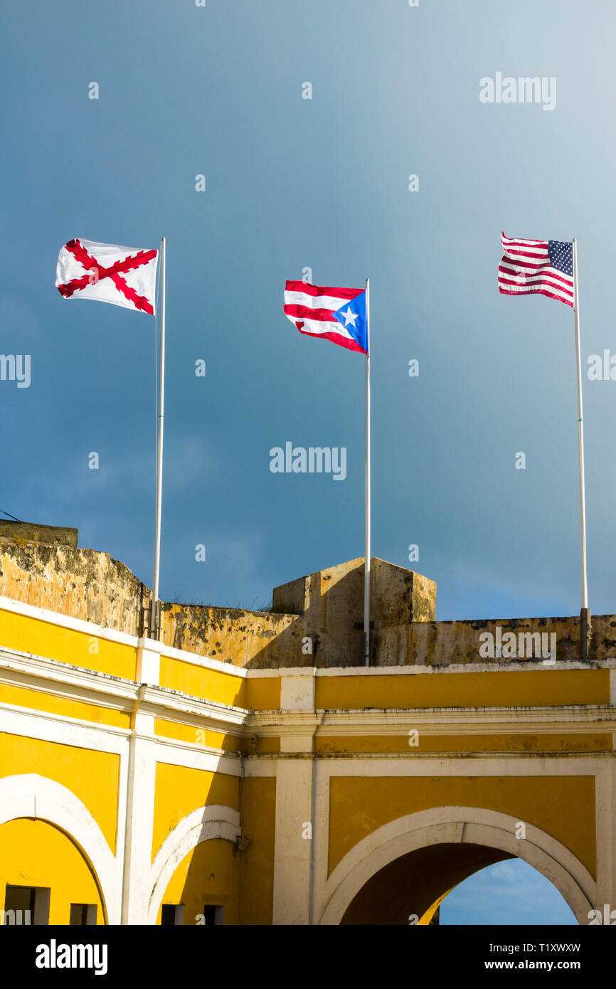 Three flags US, Puerto Rico, and Burgandy Cross of Fort Castillo San ...