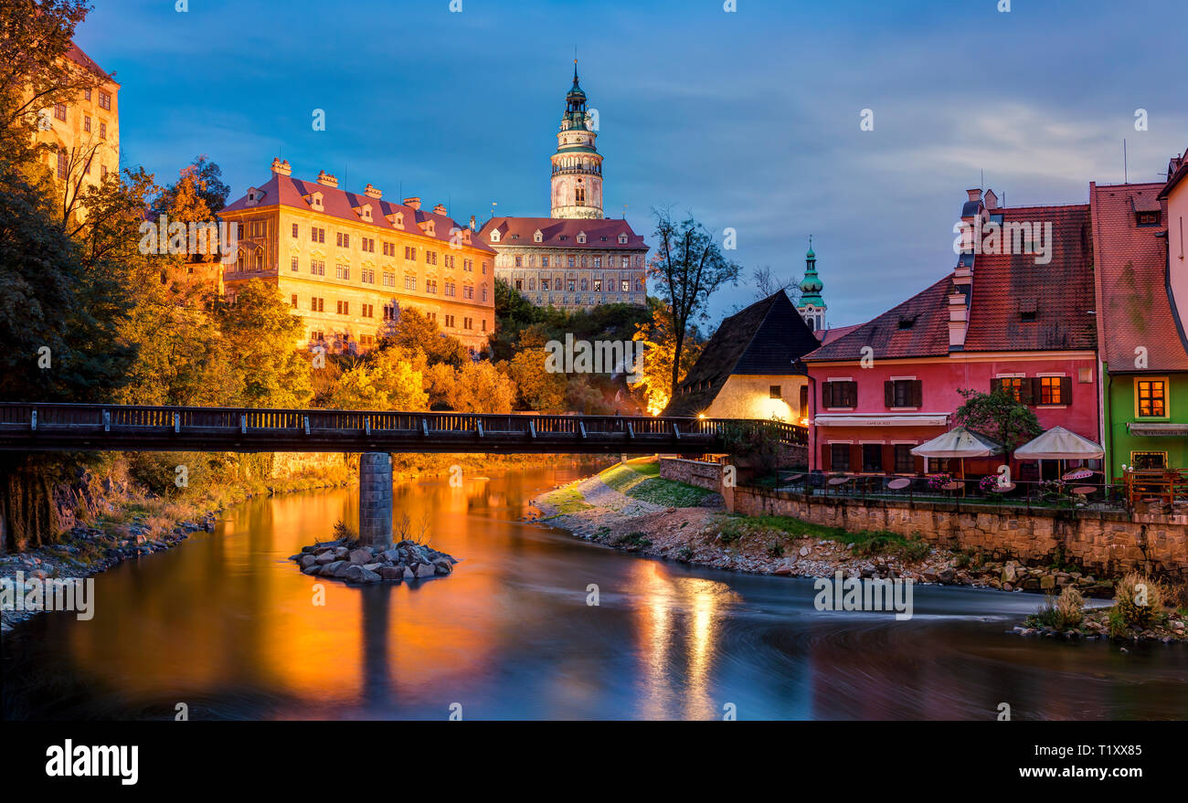 An illuminated evening view over the city of Cesky Krumlov in southern ...