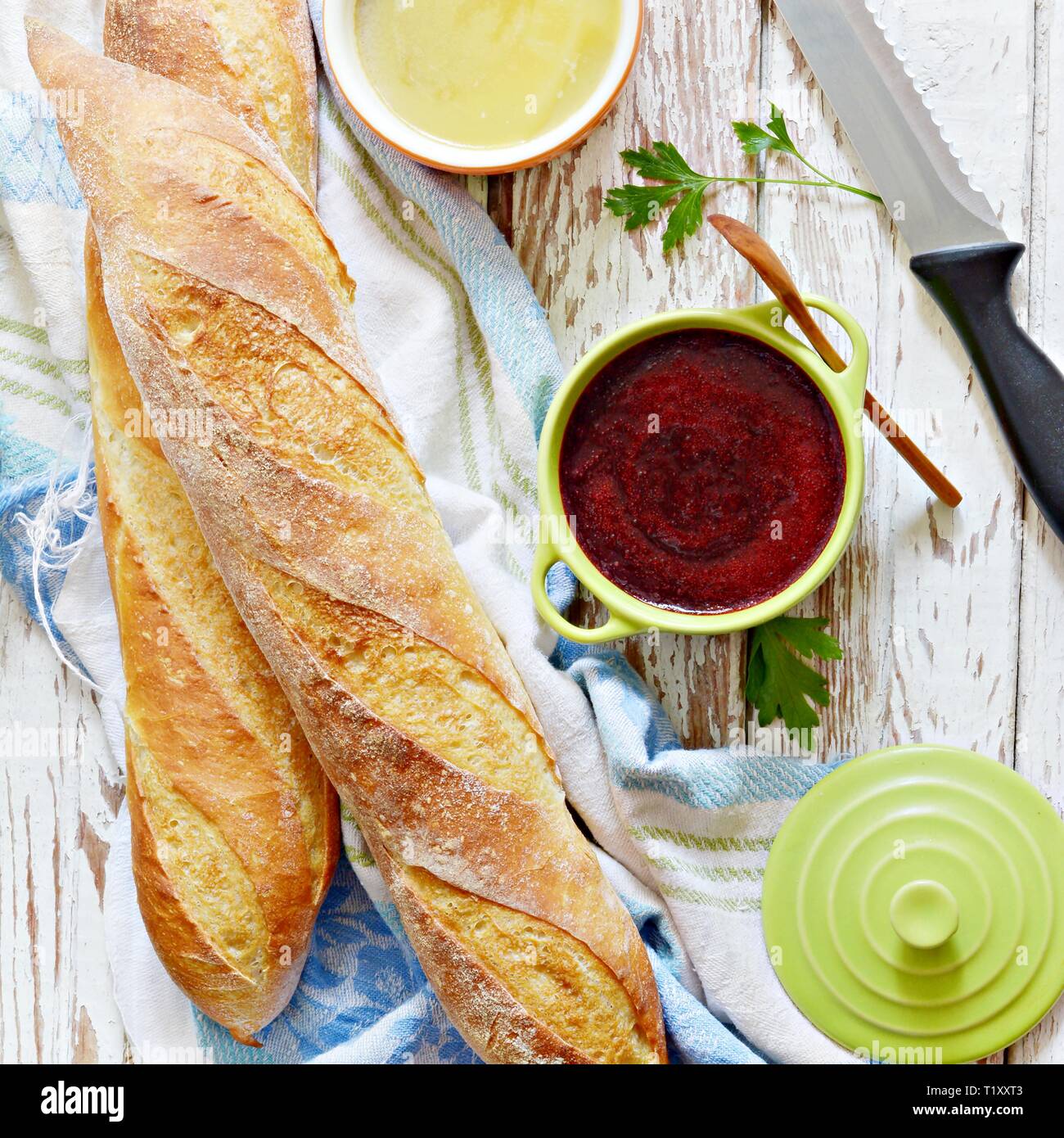 Fresh crispy French baguette with chicken liver pate and berry ...