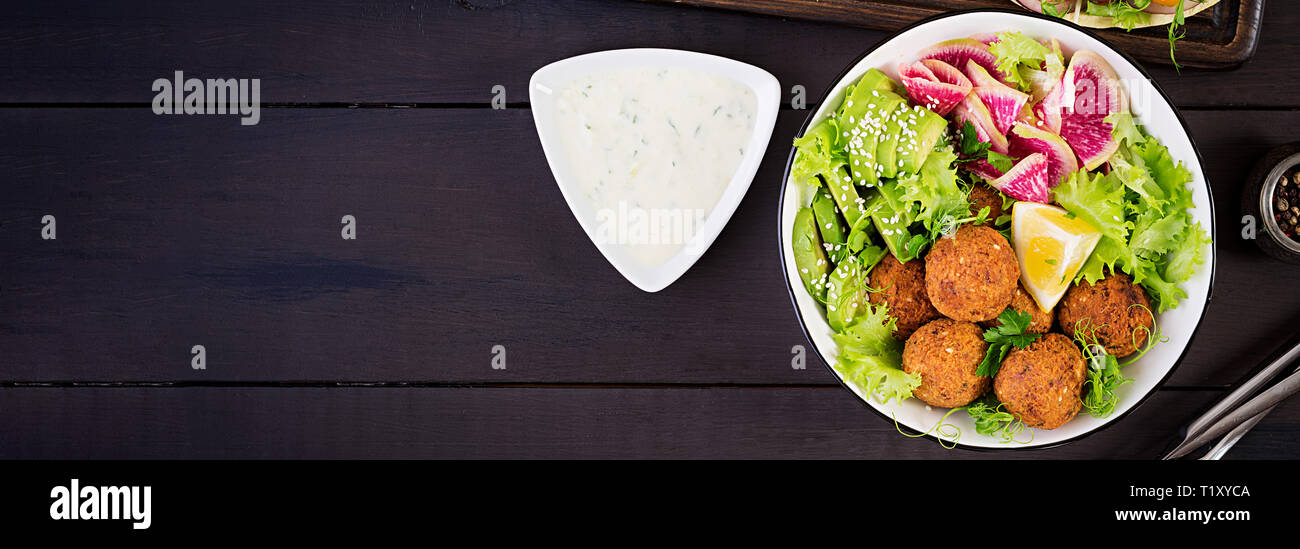 Falafel and fresh vegetables. Buddha bowl. Middle eastern or arabic ...