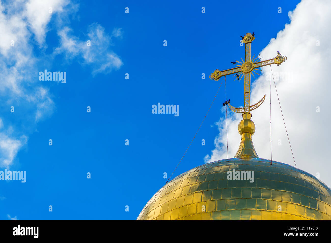 black crows sit on the golden cross of the Orthodox Church Stock Photo ...