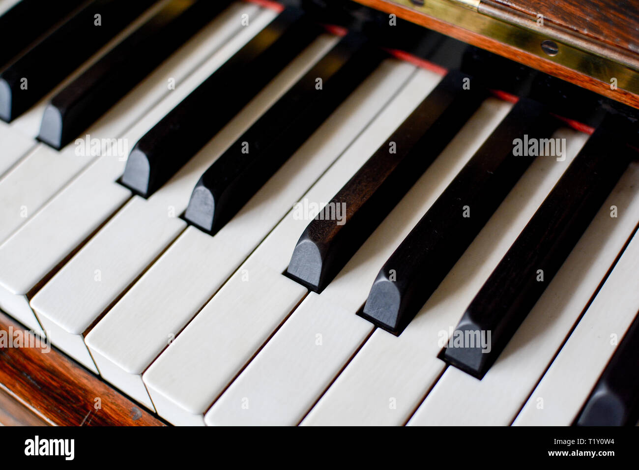 Piano keyboard of a classic wooden piano Stock Photo - Alamy