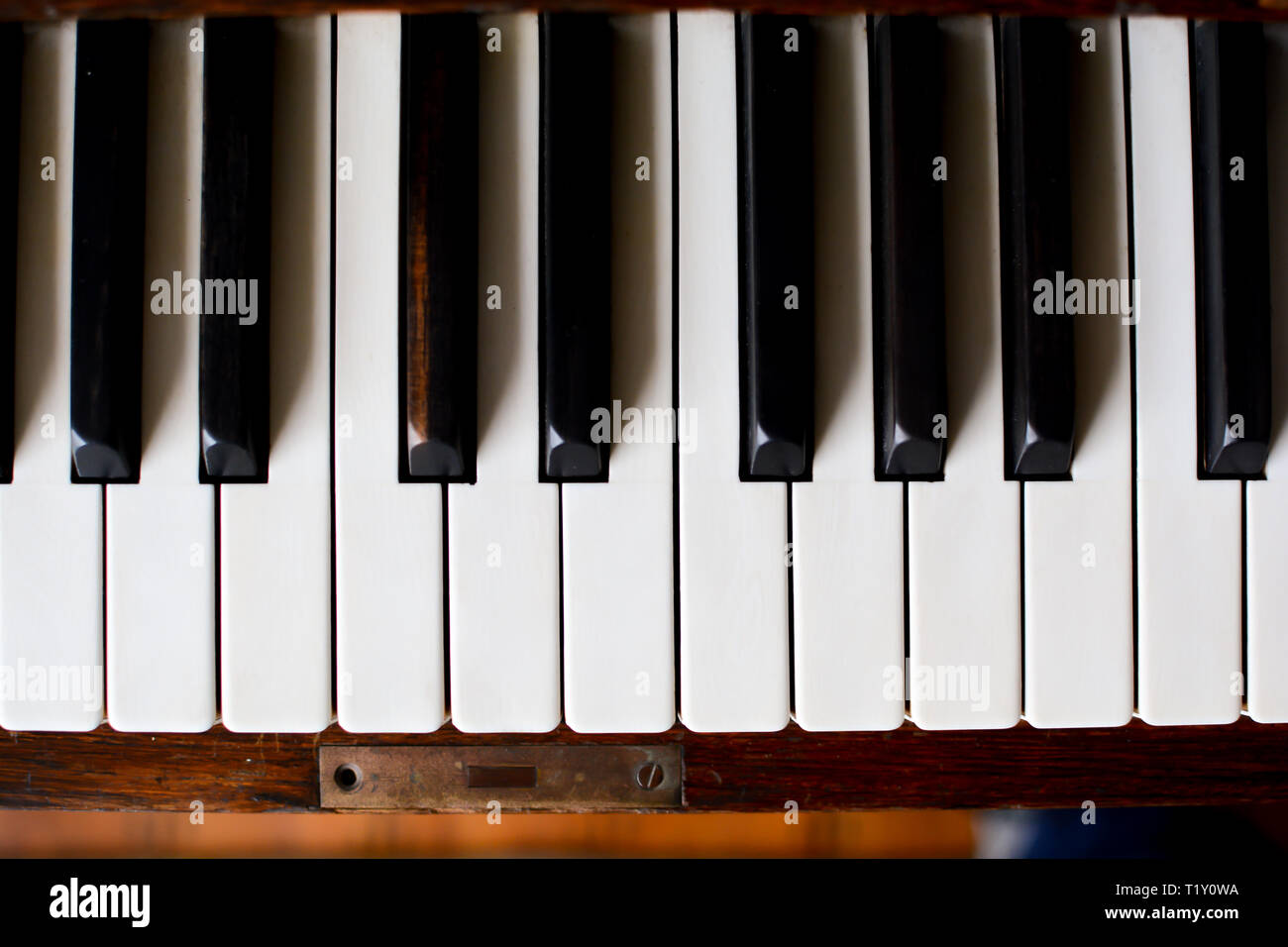 Piano keyboard of a classic wooden piano Stock Photo - Alamy