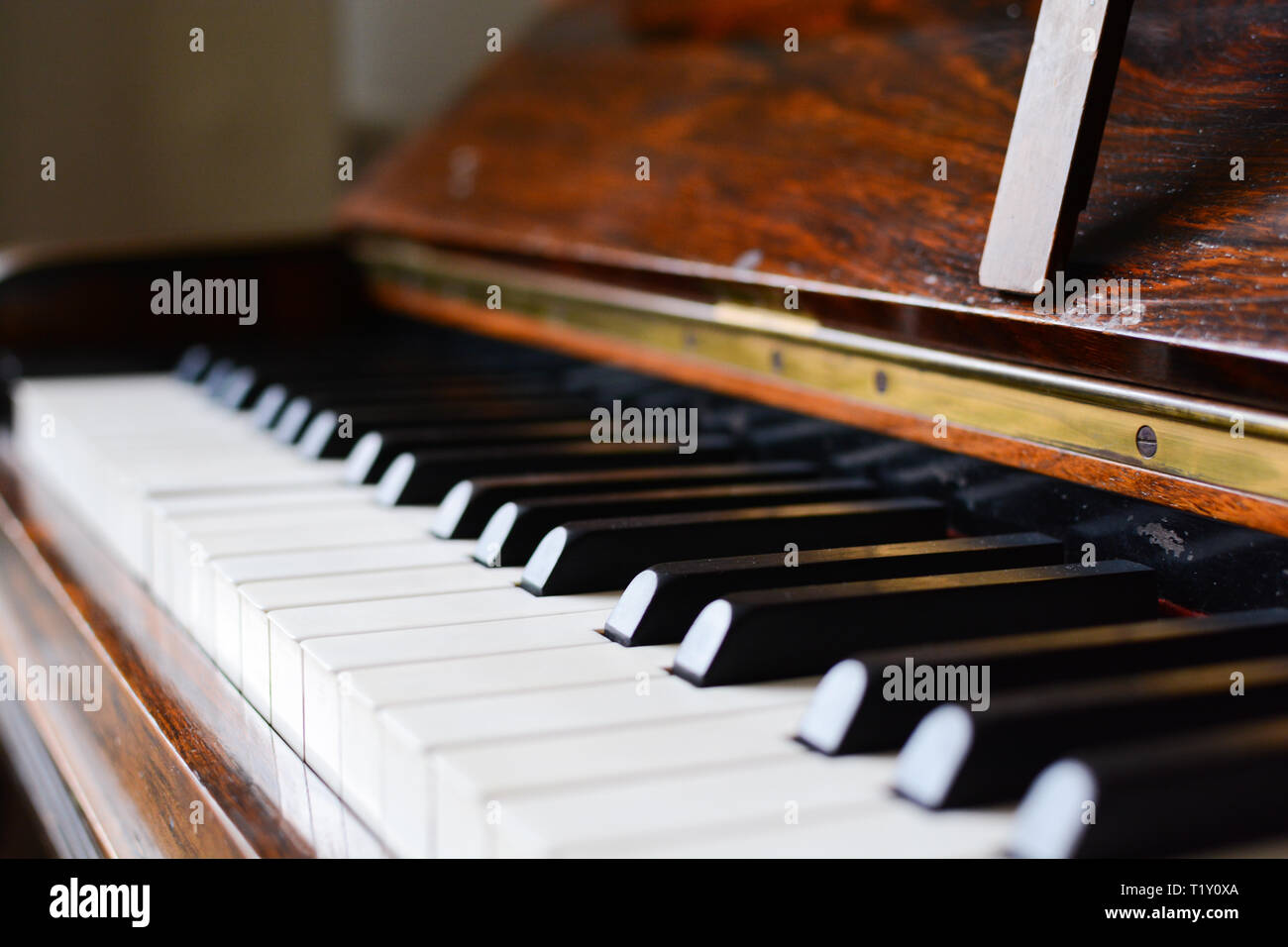 Piano keyboard of a classic wooden piano Stock Photo - Alamy