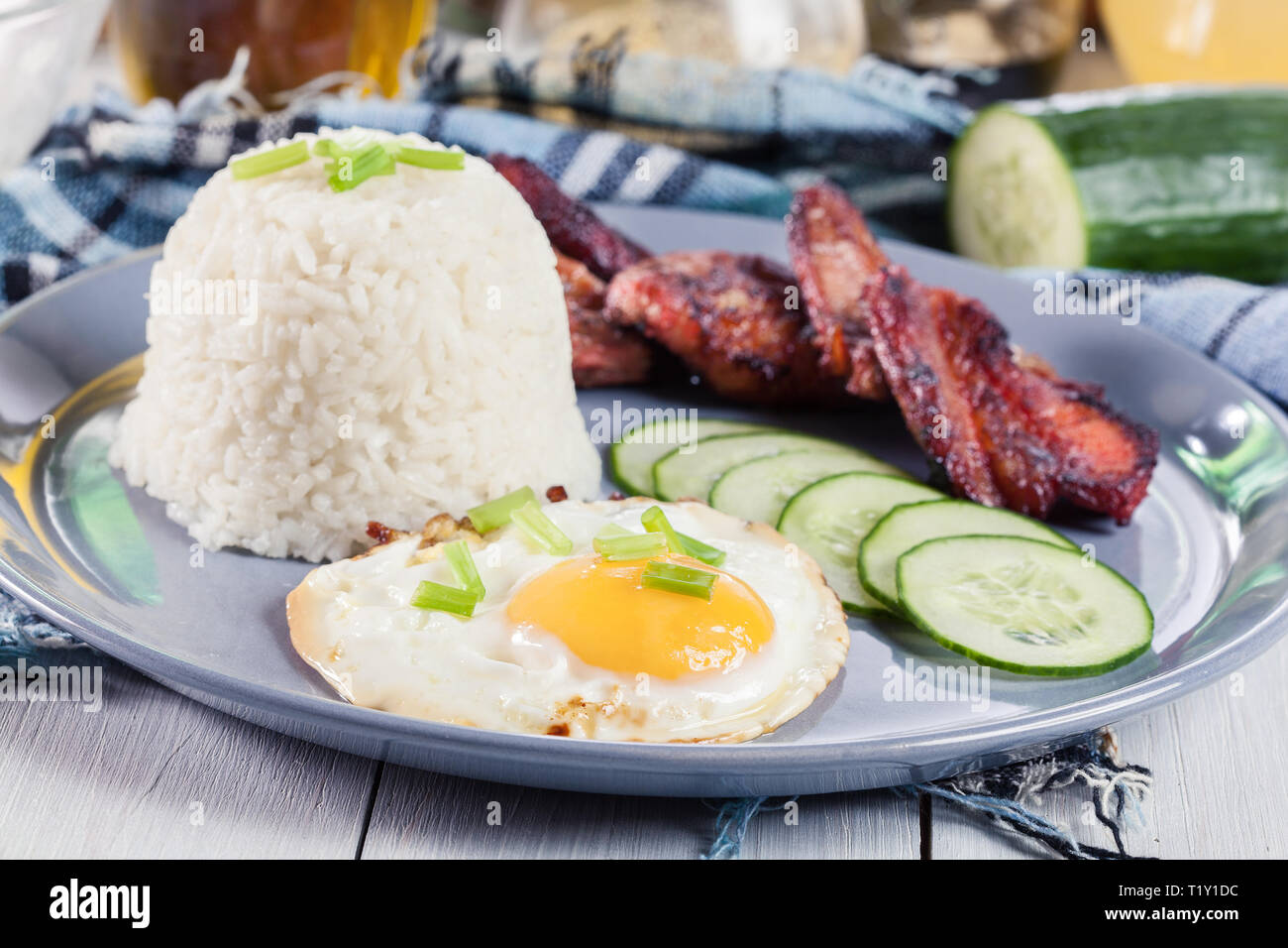 Pork tocino with rice and fried egg. Filipino dish Stock Photo - Alamy