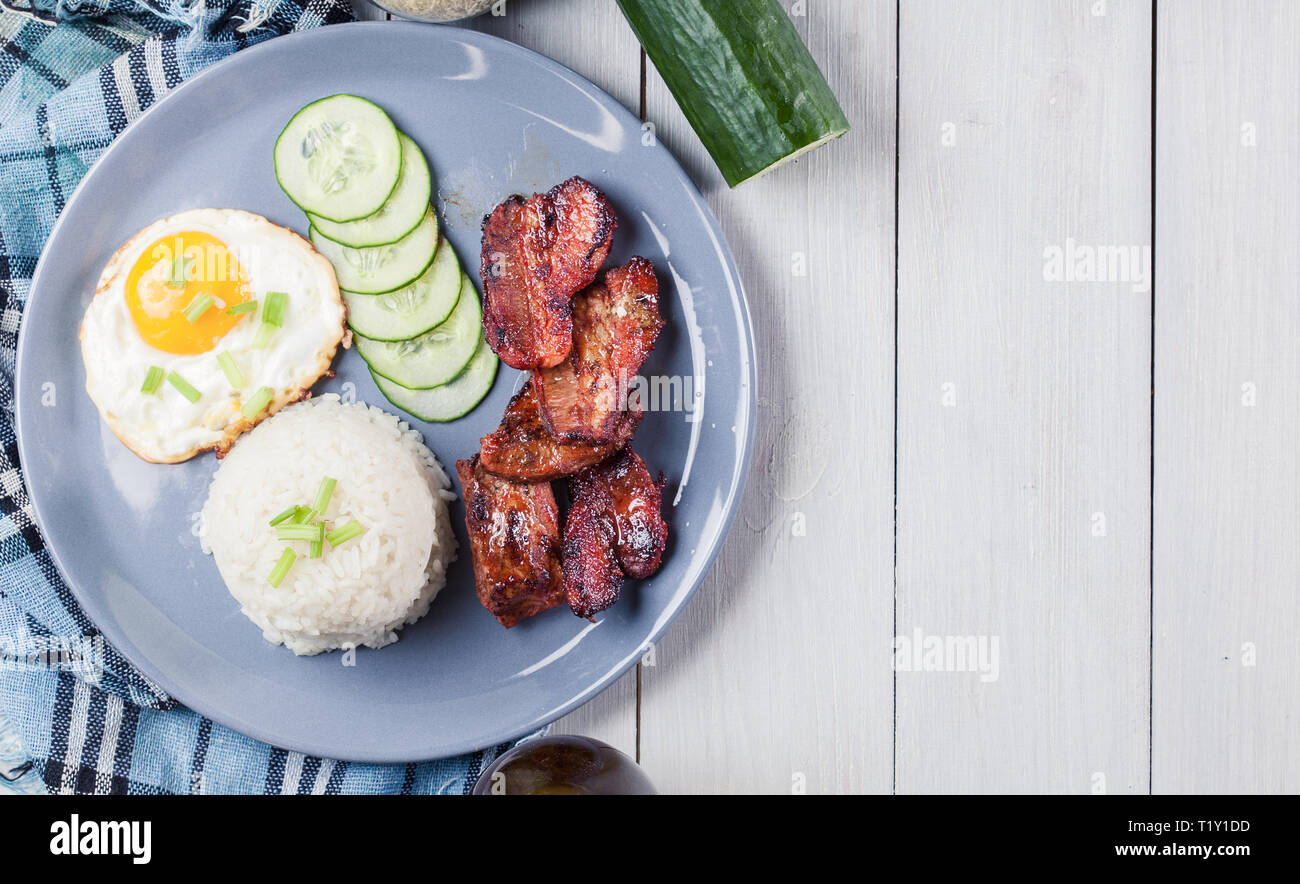 Pork tocino with rice and fried egg. Filipino dish Stock Photo - Alamy