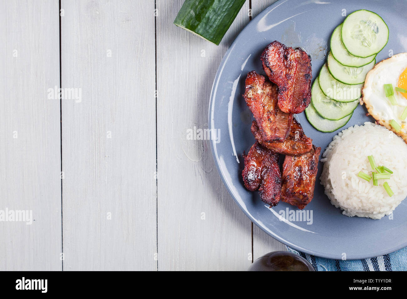 Pork tocino with rice and fried egg. Filipino dish Stock Photo - Alamy