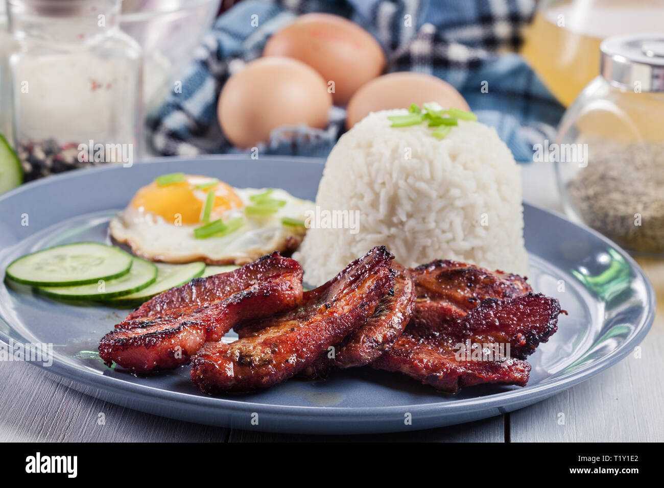 Pork tocino with rice and fried egg. Filipino dish Stock Photo - Alamy