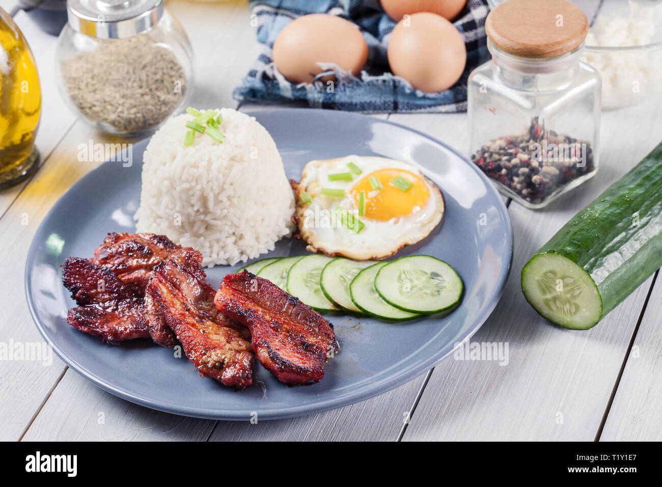 Pork tocino with rice and fried egg. Filipino dish Stock Photo - Alamy