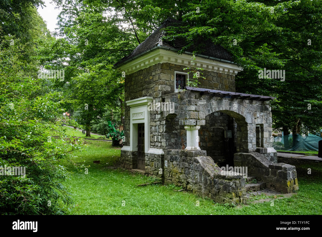 Old transformer substation in a public park , stone transformer station ...