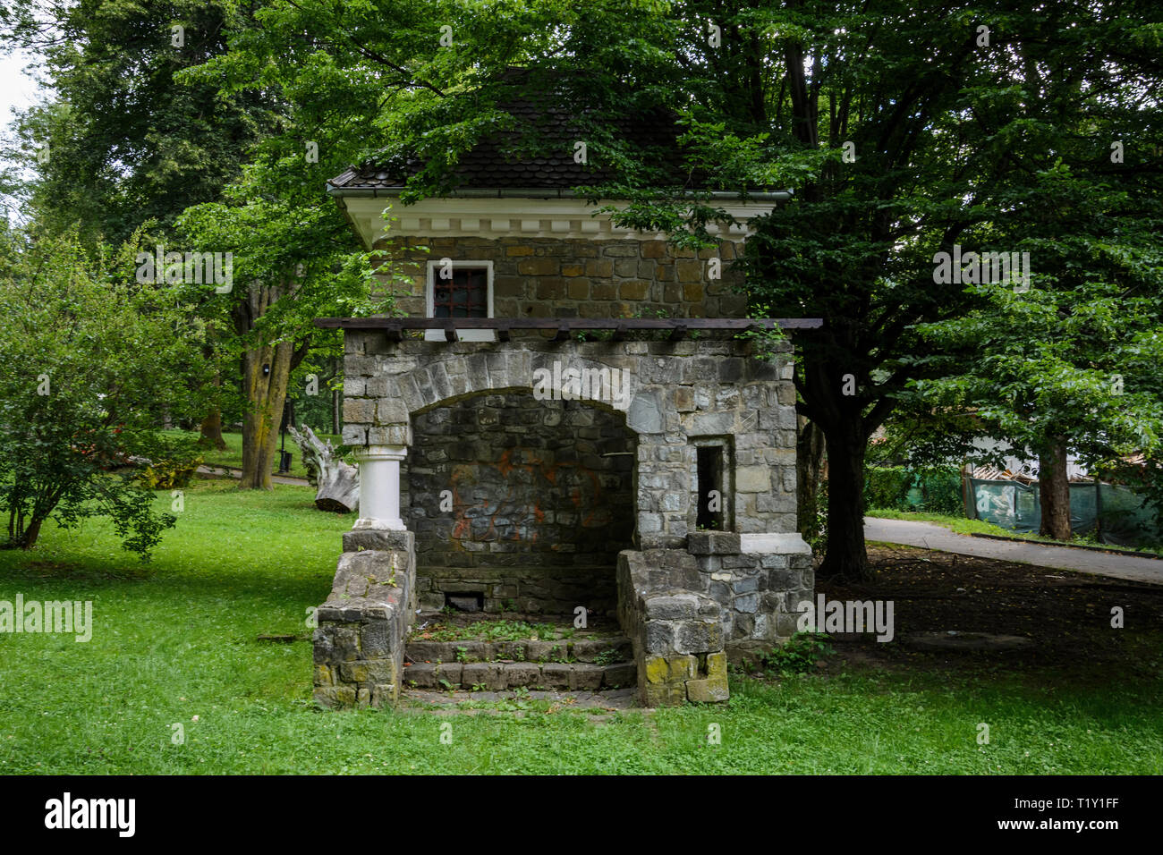Old transformer substation in a public park , stone transformer station ...