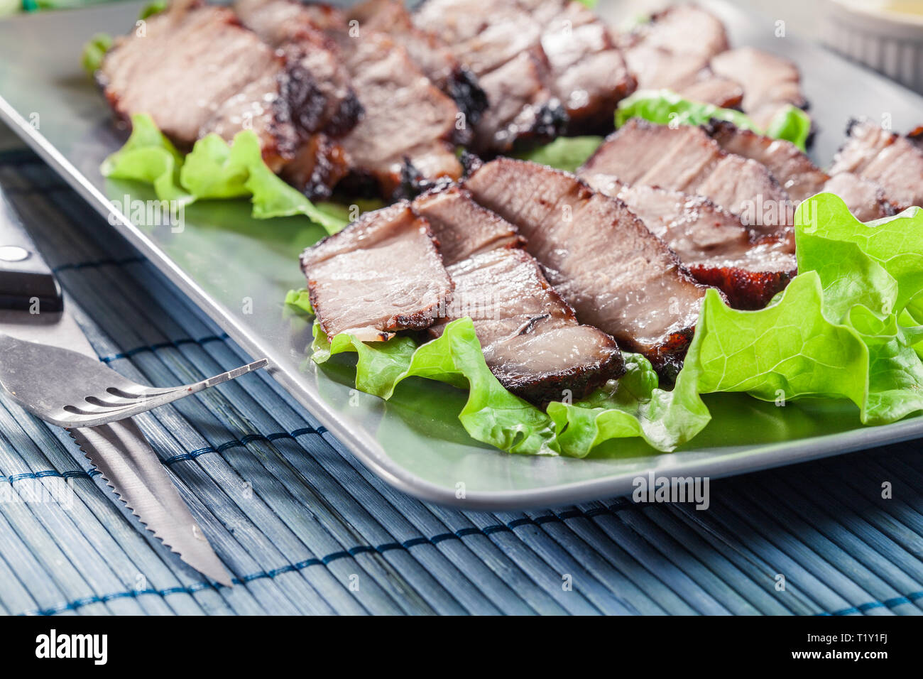 Char Siu Pork - Chinese roasted pork shoulder or pork belly on platter ...