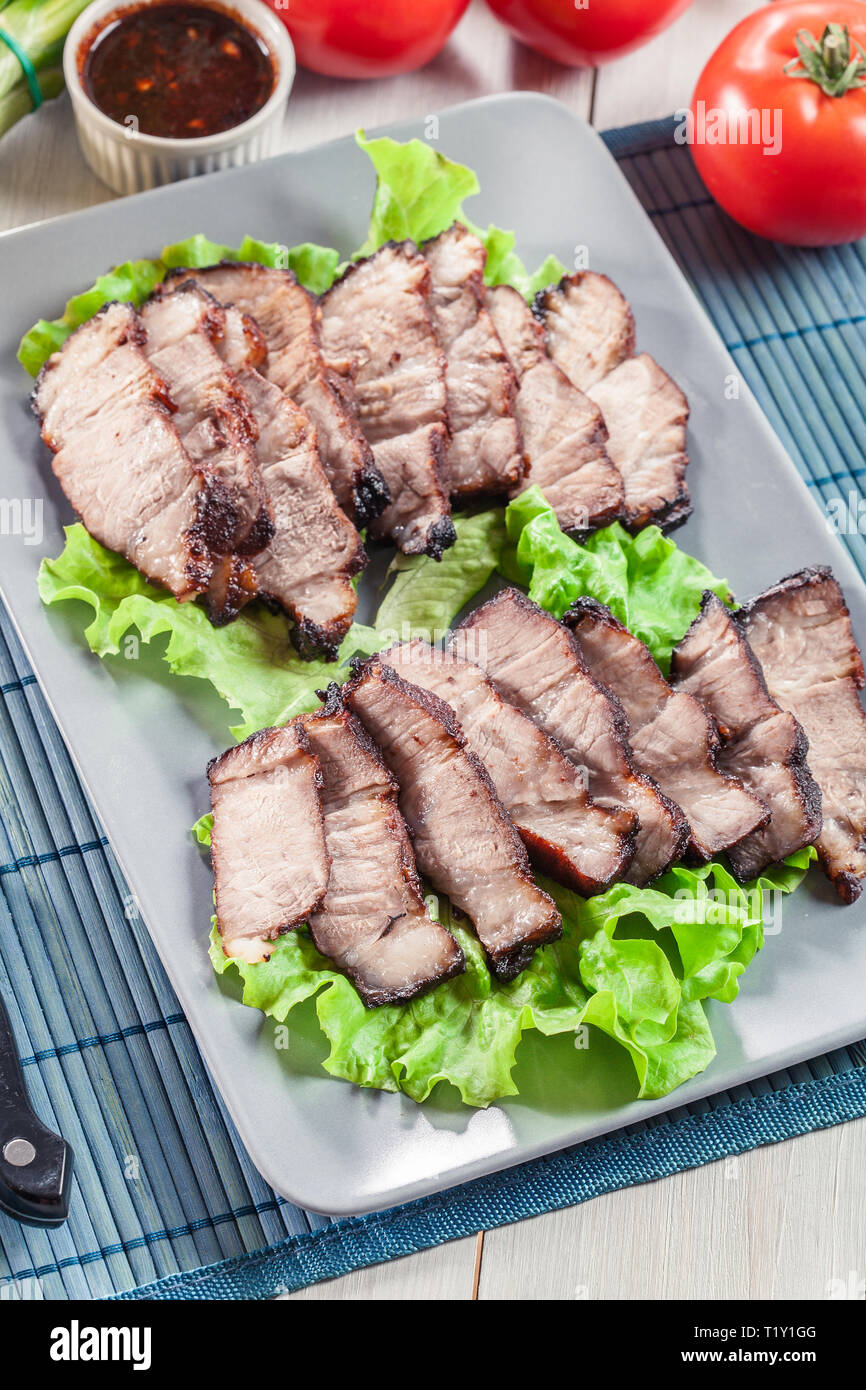 Char Siu Pork - Chinese roasted pork shoulder or pork belly on platter ...