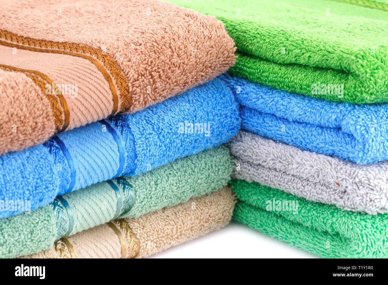 Colorful towels stacks closeup picture Stock Photo - Alamy