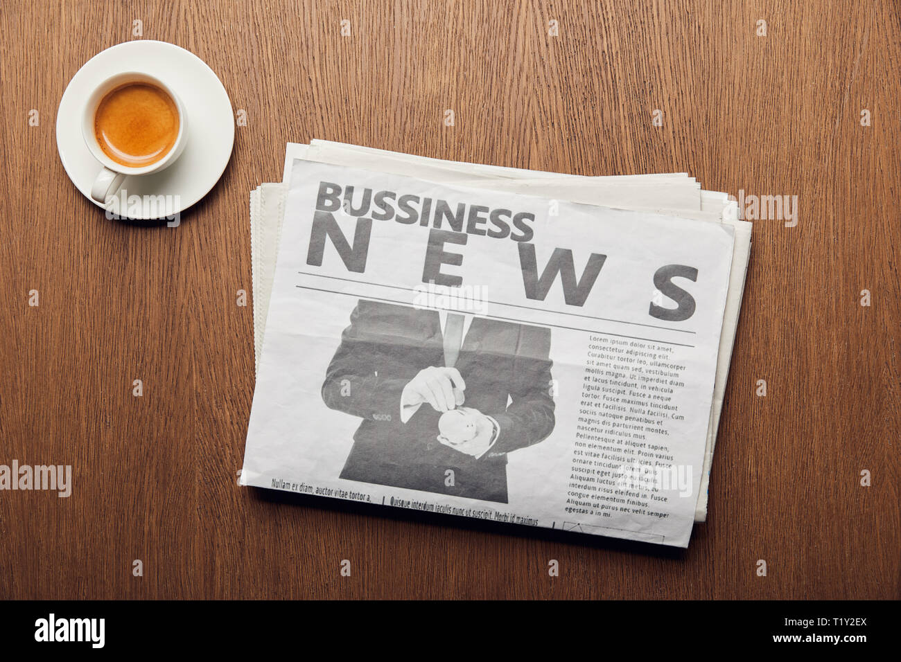 top view of business newspaper near cup with coffee Stock Photo - Alamy